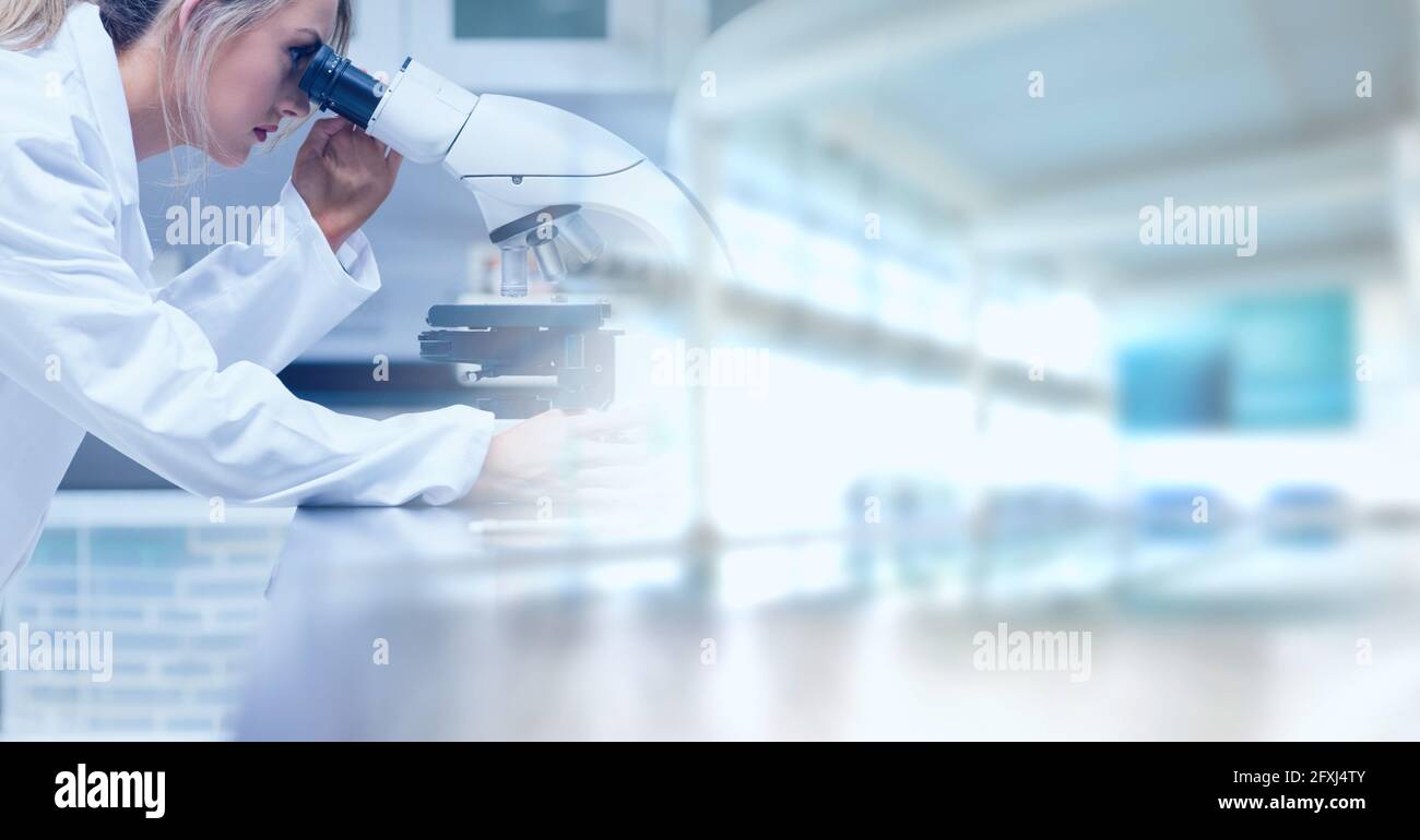 Lab technician using microscope hi-res stock photography and images - Alamy