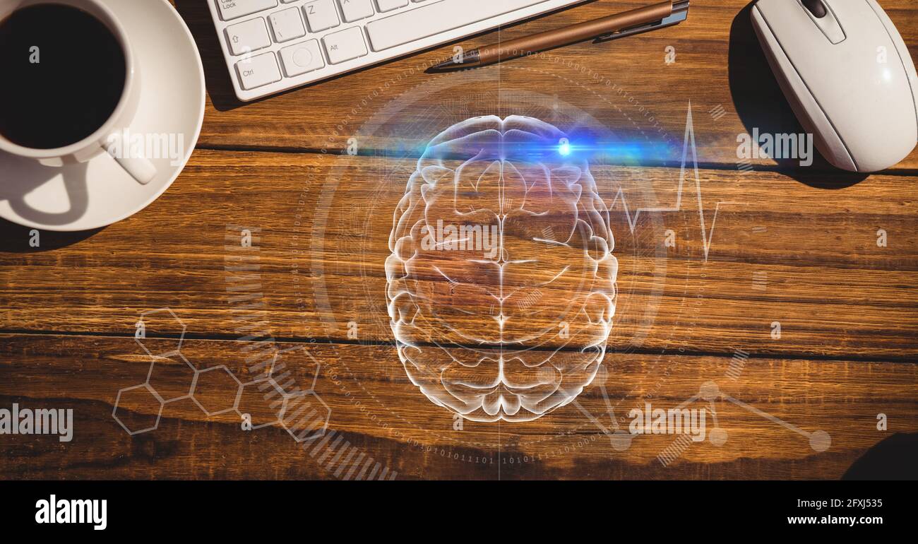 Composition of coffee and keyboard on office desk, with medical brain ...