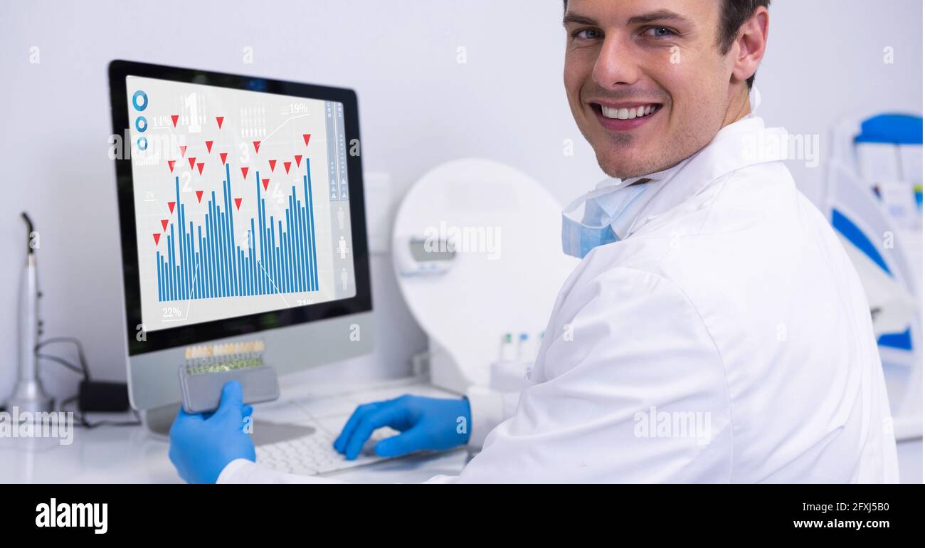 Composition of smiling male doctor using computer with medical research ...