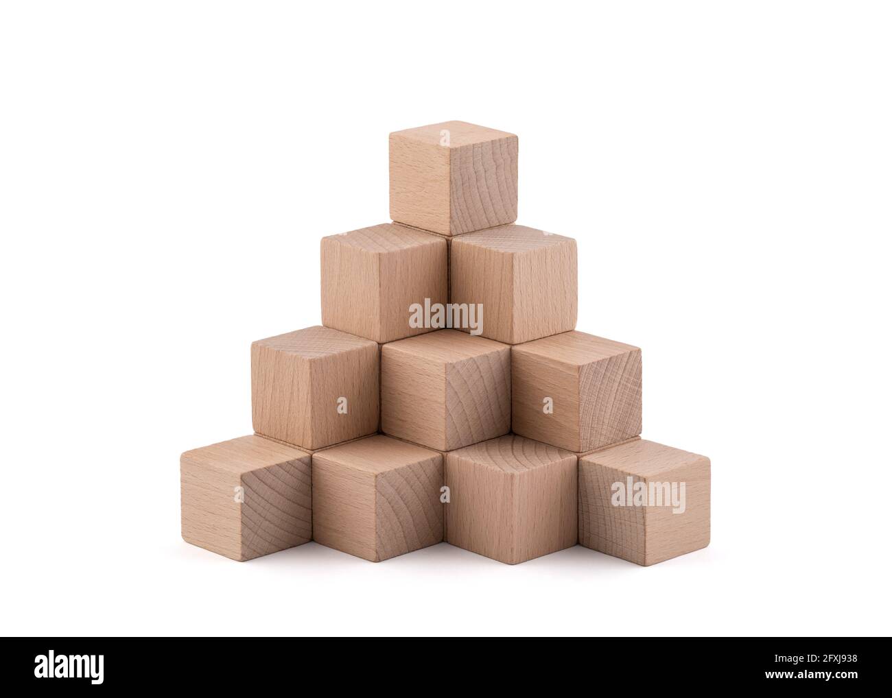 Wooden block stairs build in a pyramid shape isolated on white ...