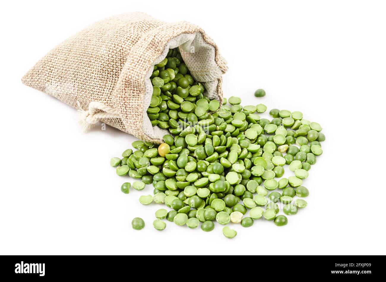 organic green split peas filling in sack bag on a white background ...
