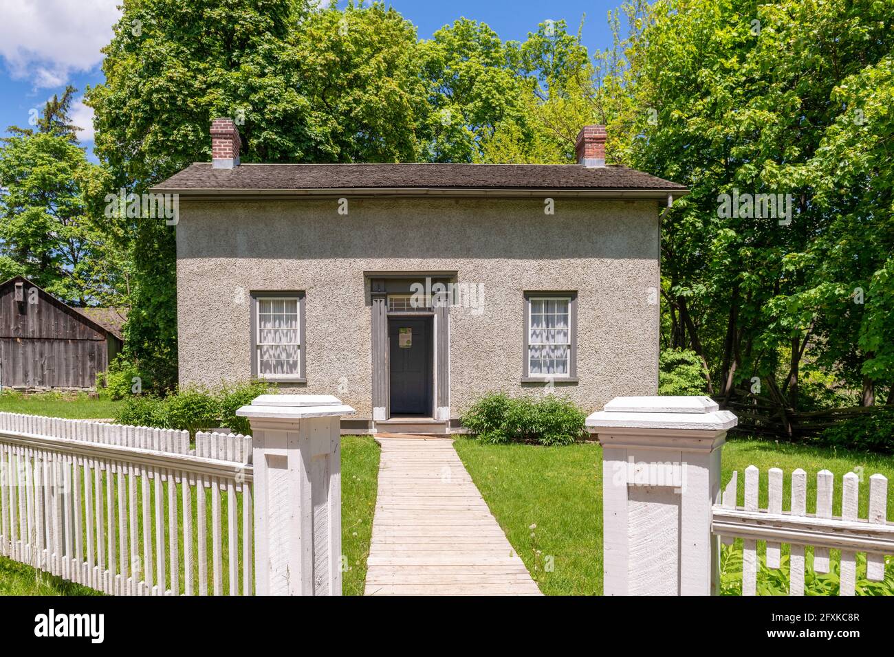 Facade and entrance to the Pastor's house located in the Black Creek ...