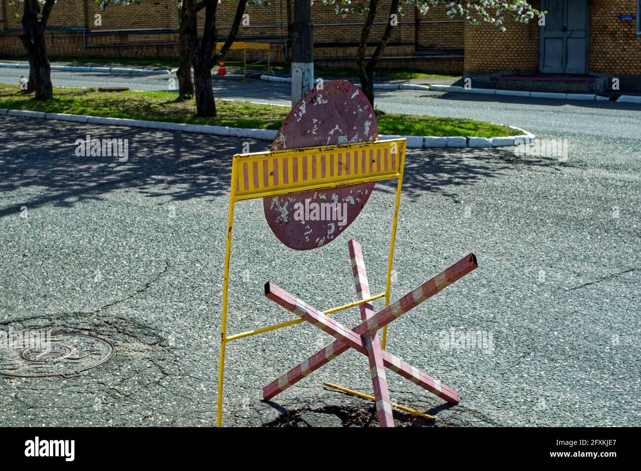 road sign over a pit on the road, moscow Stock Photo - Alamy