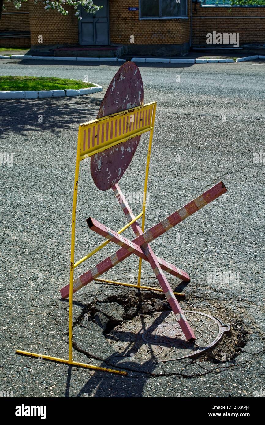 Bright orange road works warning sign hi-res stock photography and ...