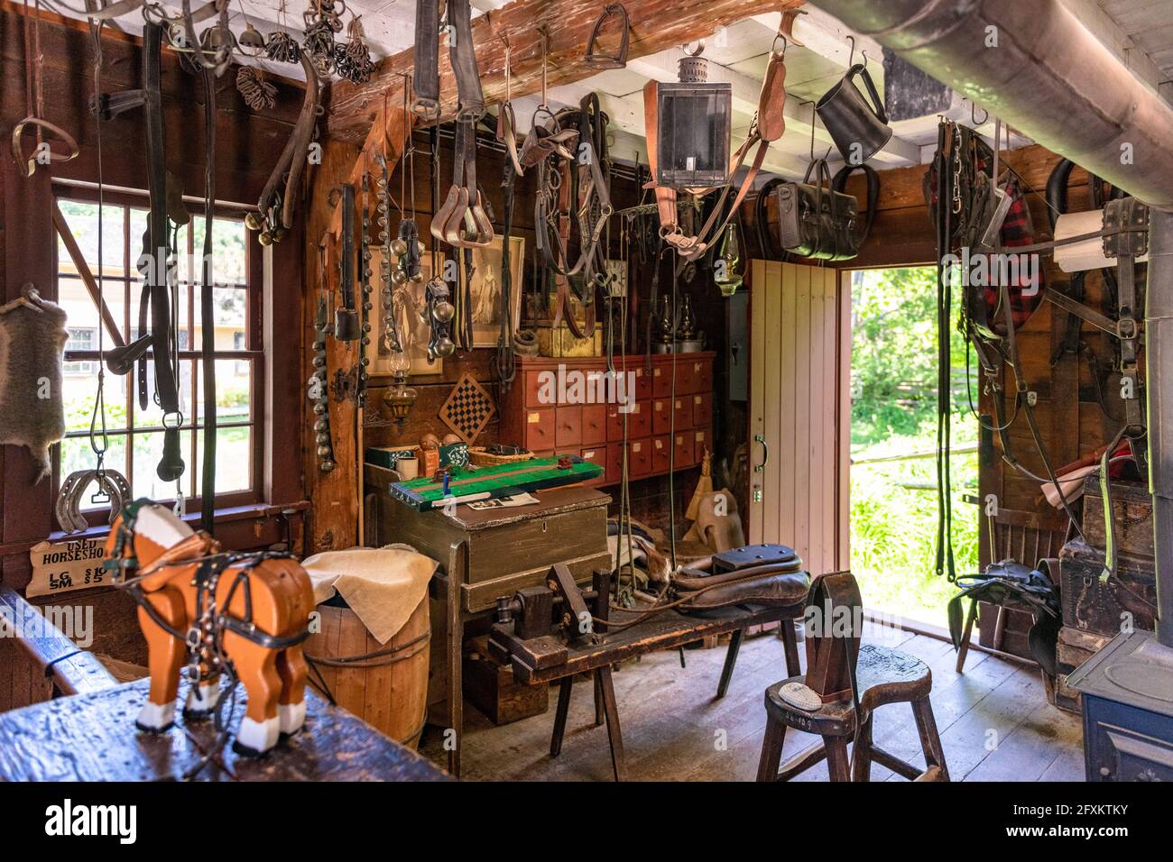 Inside of a tinsmith shop in the Black Creek Pioneer Village which is a ...