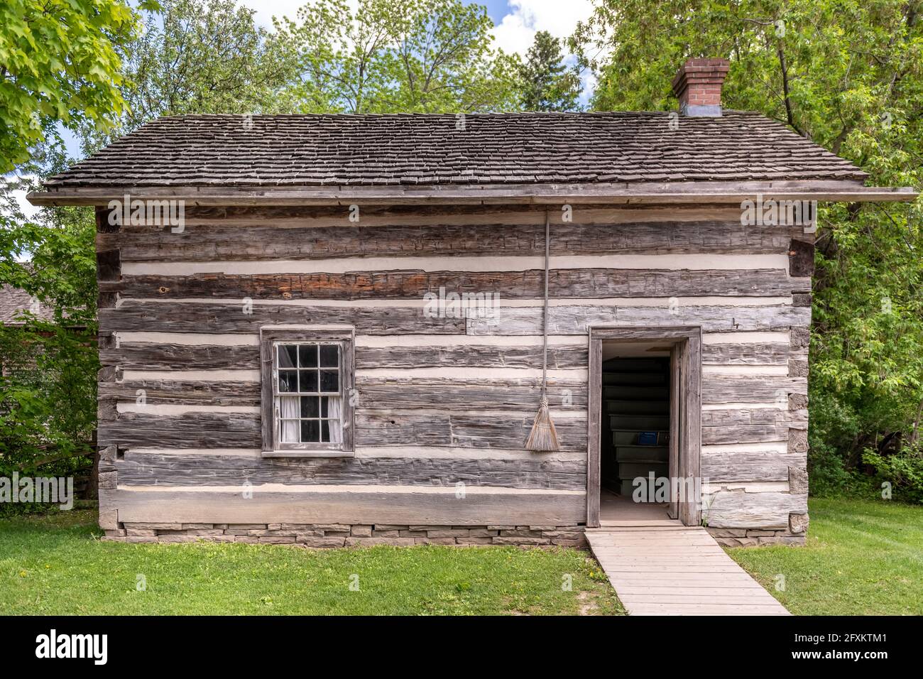 Simple colonial style wooden house exterior. Black Creek Pioneer ...
