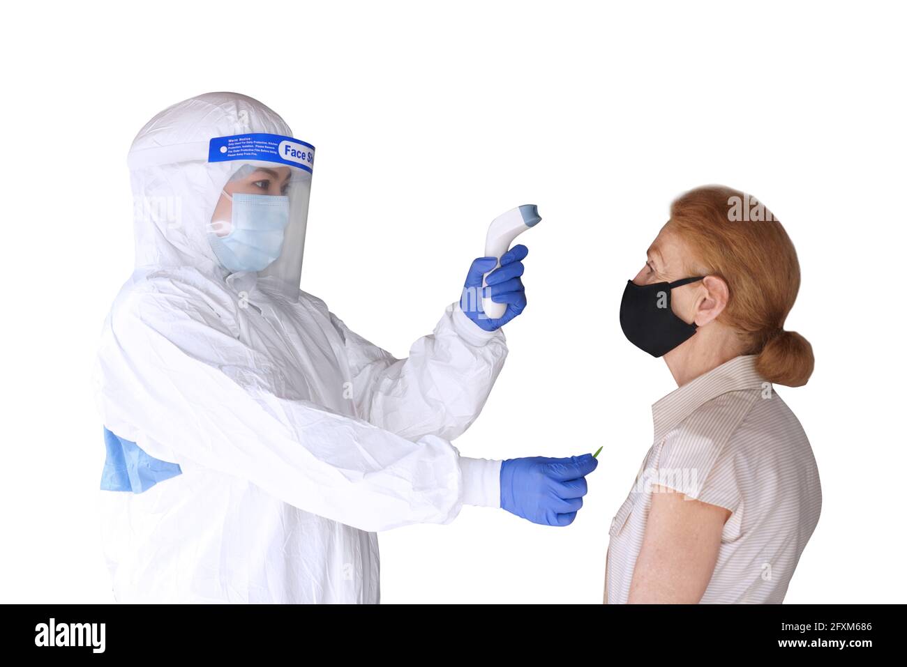 Disease control experts use an Infrared thermometer equipment to check ...