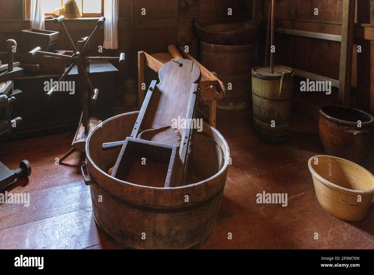 Antique wood objects inside a house room. The items are seen in the ...