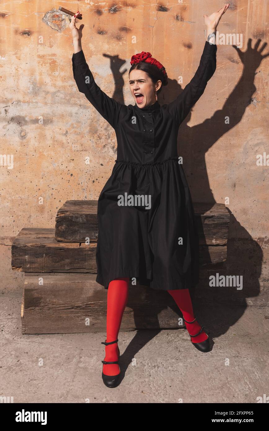 Portrait of young woman in the image of a famous artist, personality on ...