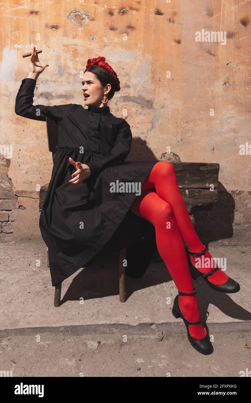 Young woman in image of famous artist, personality on vintage ...