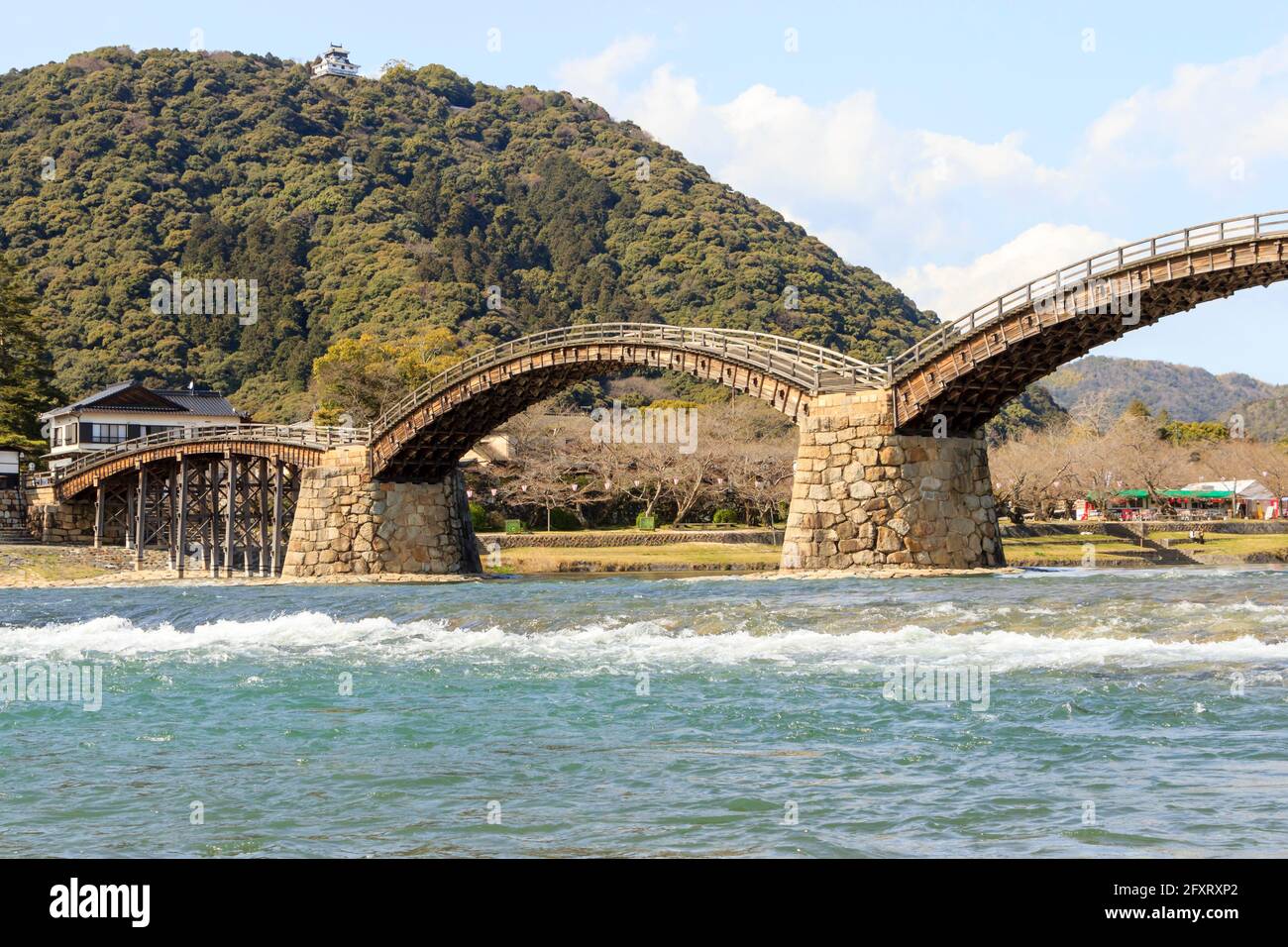 Mid-day view of Kintaikyo Bridge, an ancient, wooden bridge in ...