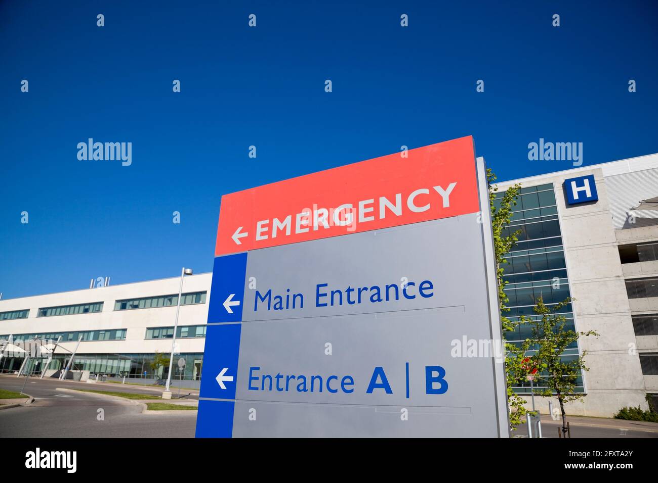 Modern hospital and sign with clear blue sky taken in Brampton Ontario ...