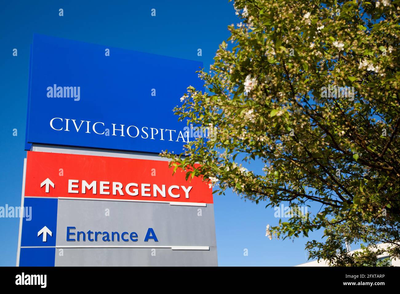 Modern hospital and sign with clear blue sky taken in Brampton Ontario ...