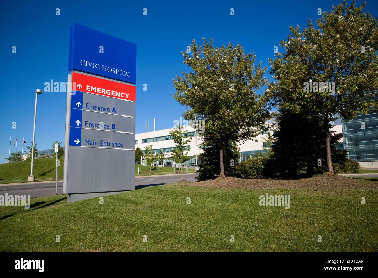Modern hospital and sign with clear blue sky taken in Brampton Ontario ...