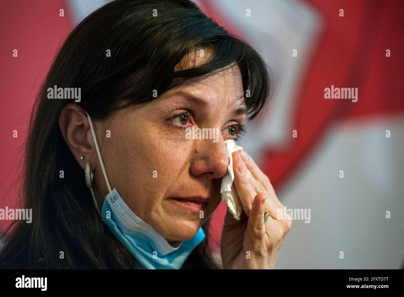 Natalya Protasevich, mother of Roman Protasevich cries during the press ...