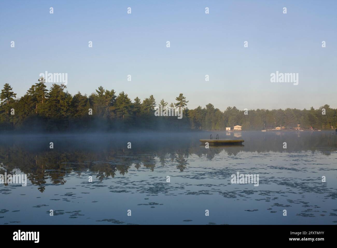 Calm lake water shot in Muskoka, Ontario Cottage Country Stock Photo ...