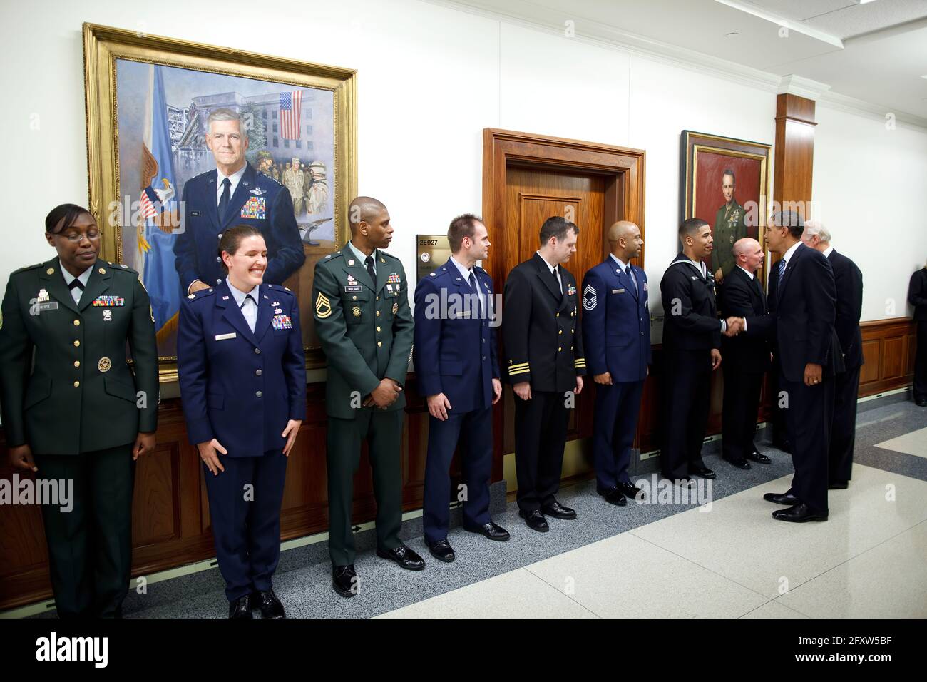 President Barack Obama and VP Joe Biden greet military personnel during ...