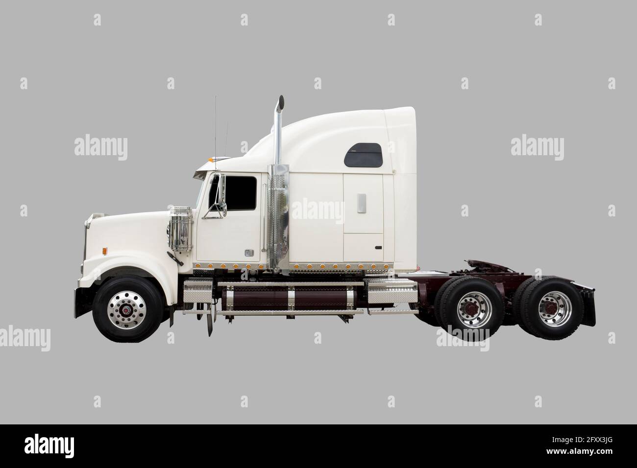 Cream coloured transport truck isolated on grey. Clipping path included ...