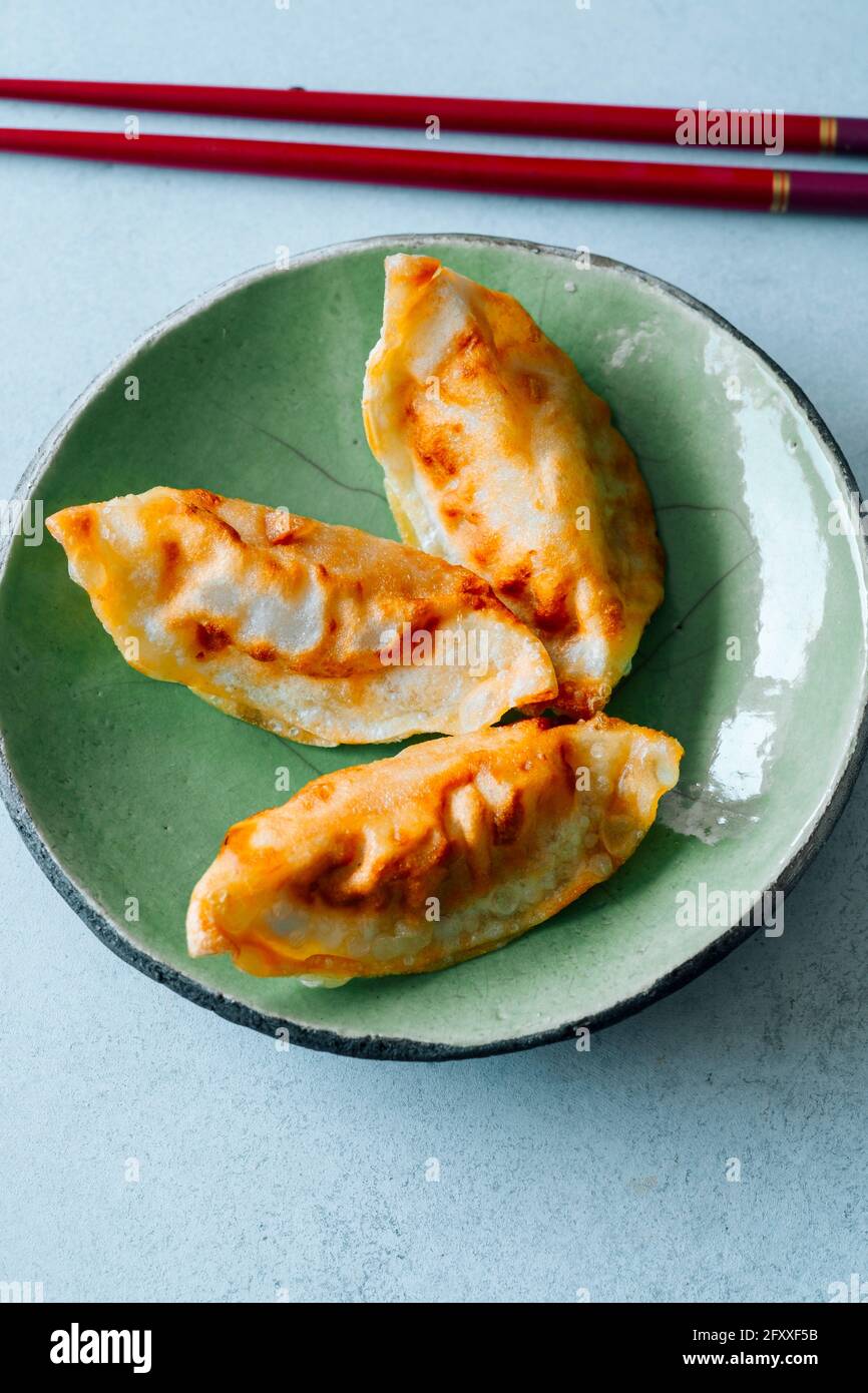 Golden dumpling hi-res stock photography and images - Alamy