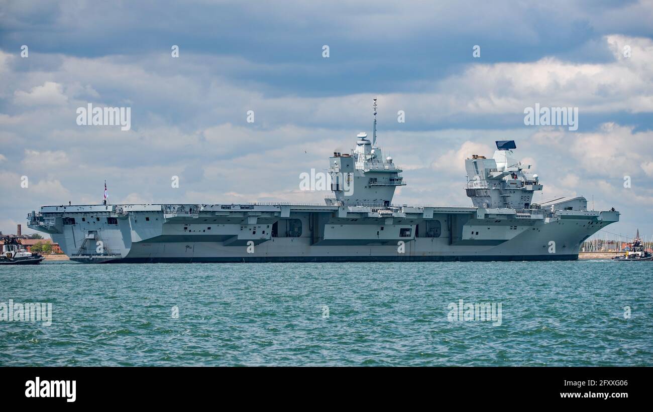 The Royal Navy aircraft carrier HMS Prince of Wales (R09) returning to ...