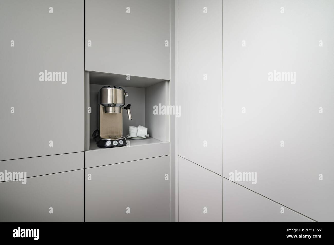 Modern gray kitchen corner with espresso coffee machine Stock Photo - Alamy