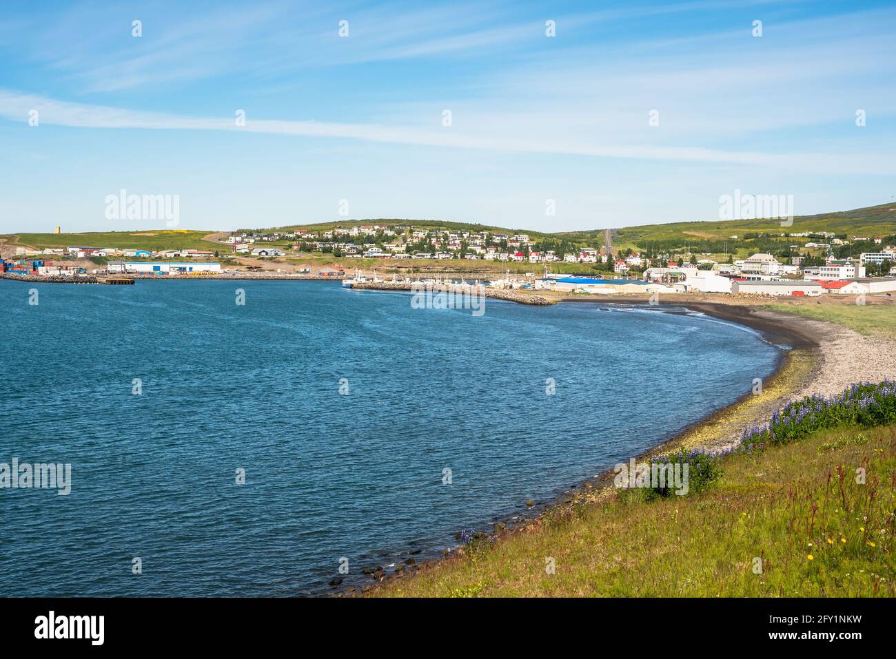 View of a beautiful coastal town with hillside houses overlooking a ...