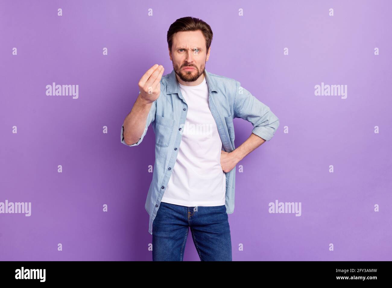 Photo of angry young mad unhappy man demand money hold hand italian ...