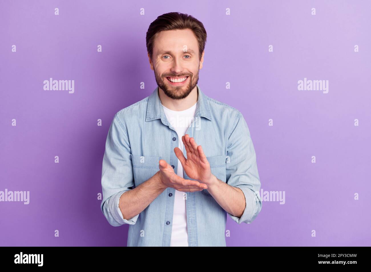 Photo of cheerful young positive happy man clap hands congratulations ...