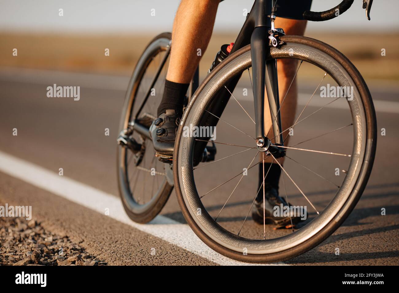 Person sitting on the bike hi-res stock photography and images - Alamy