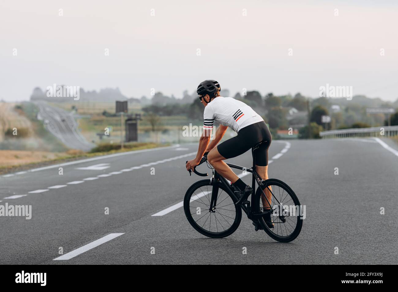 Young man racing cycle hi-res stock photography and images - Alamy