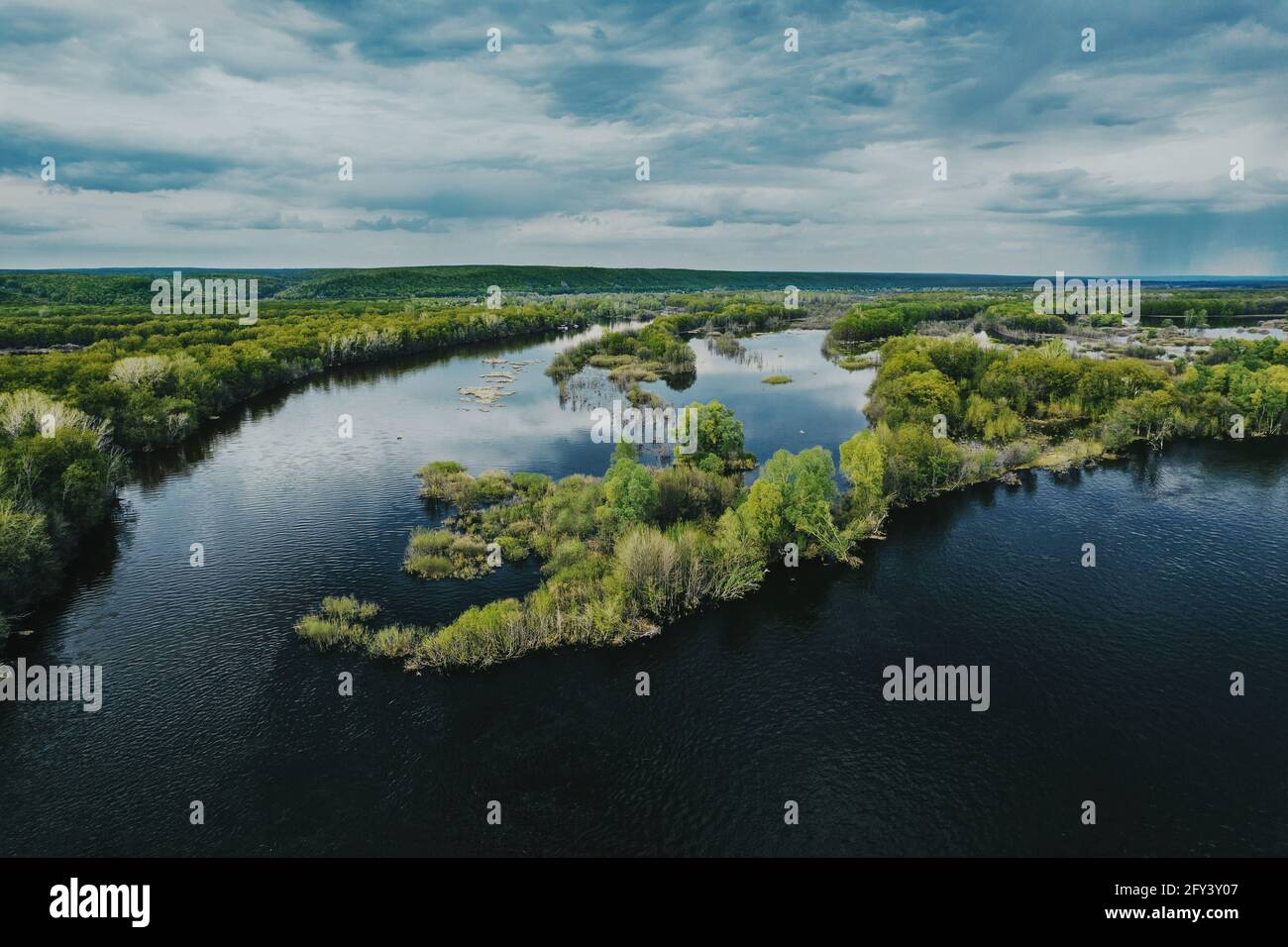 Spring overflow landscape, trees and bush impounded by spring high ...