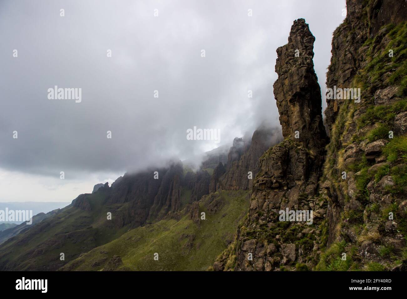 A weathered basalt pillar in the Drakensberg Mountains on the border ...