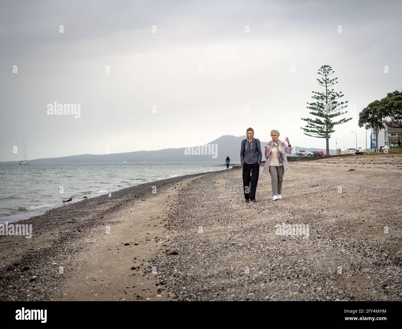 AUCKLAND, NEW ZEALAND - May 18, 2021: Two women walking at Bucklands ...