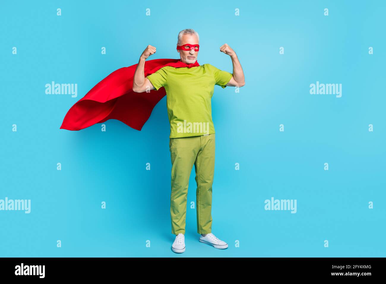 Full length body size view of handsome grey-haired superman ...