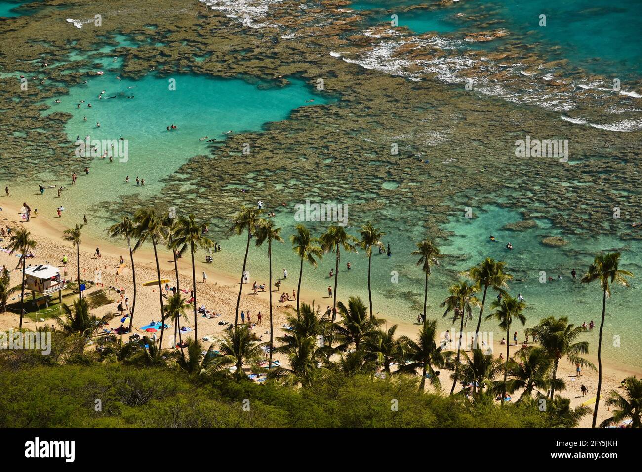 Aerial of calm, turquoise tropical waters and coral reef, Hanauma Bay ...