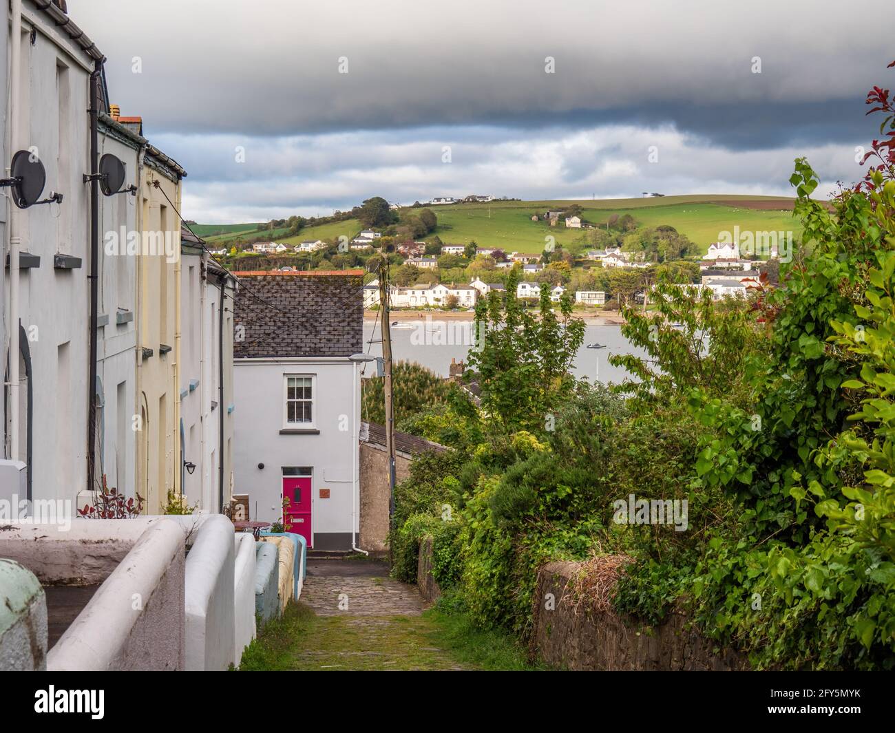 View across Estuary from scenic narrow street in the picturesque ...