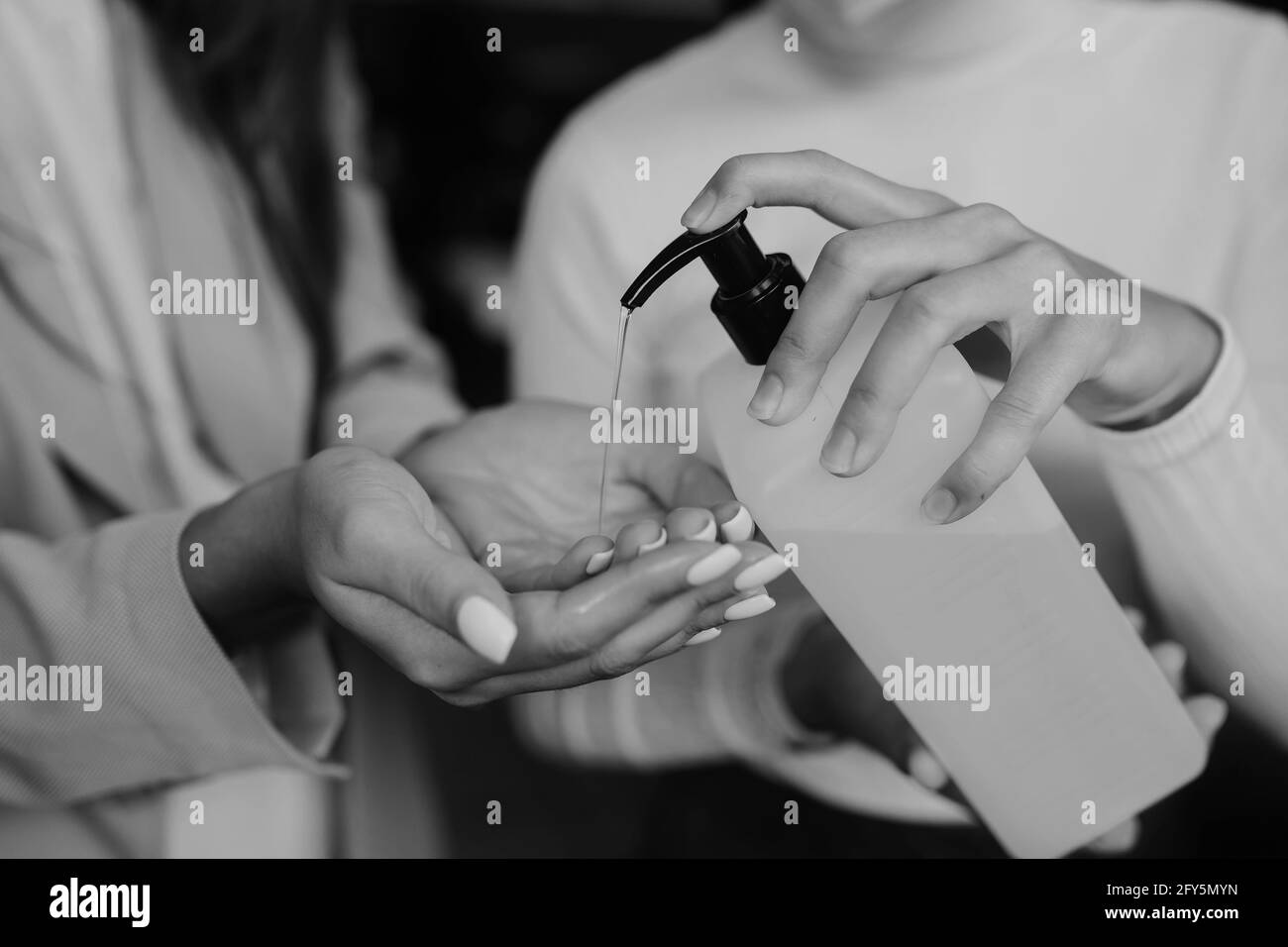 Female hands applying antibacterial liquid soap close up Stock Photo ...