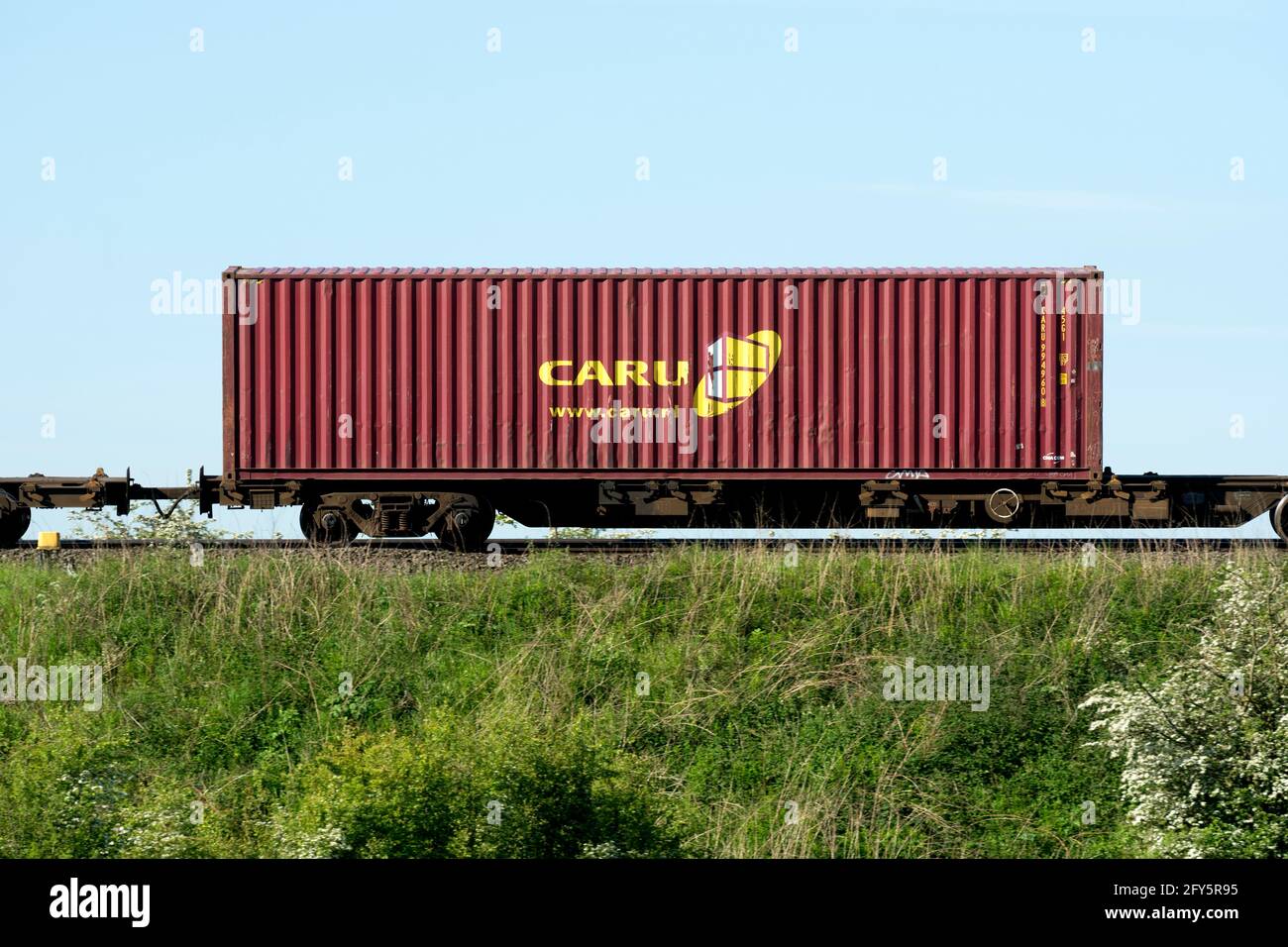 CARU shipping container on a freightliner train, Warwickshire, UK Stock ...
