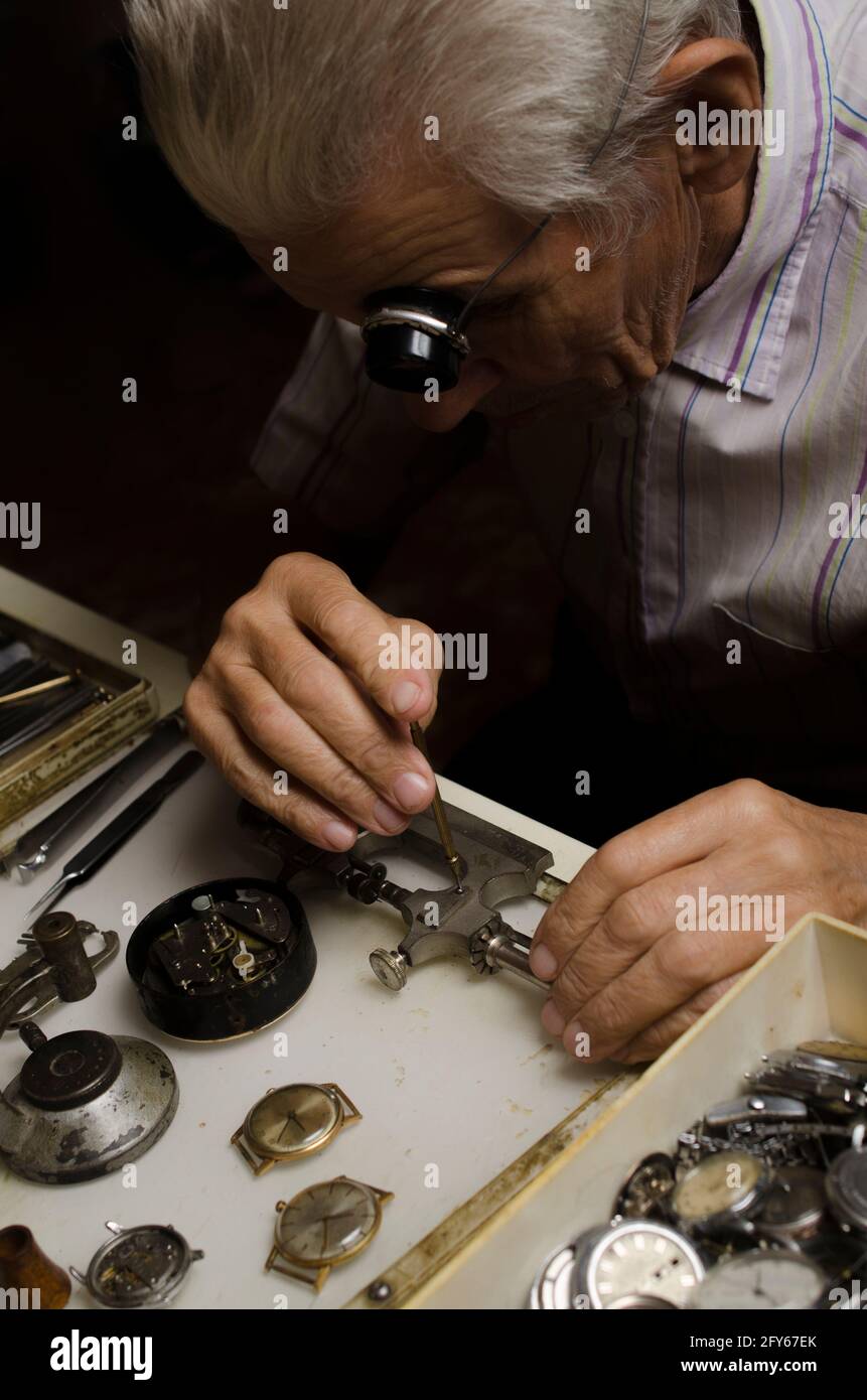 old watchmaker at work Stock Photo - Alamy