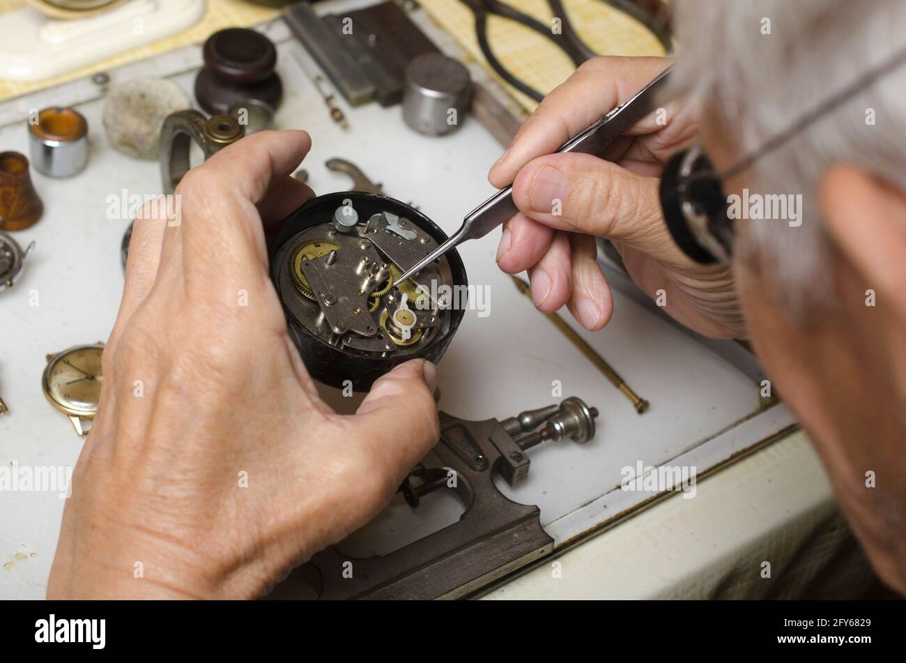old watchmaker at work Stock Photo - Alamy