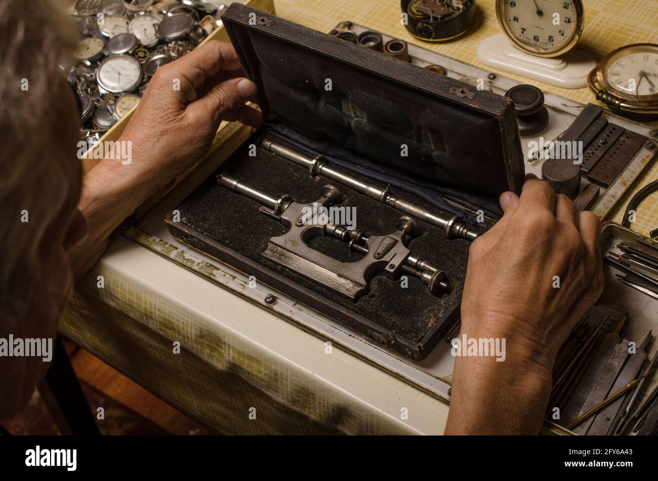 old watchmaker at work Stock Photo - Alamy