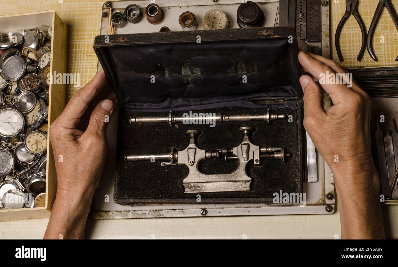 old watchmaker's tool: clock lathe in the box Stock Photo - Alamy