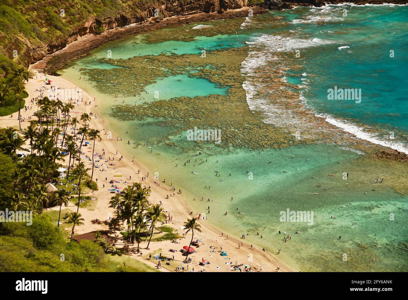 Aerial of calm, turquoise tropical waters and coral reef, Hanauma Bay ...