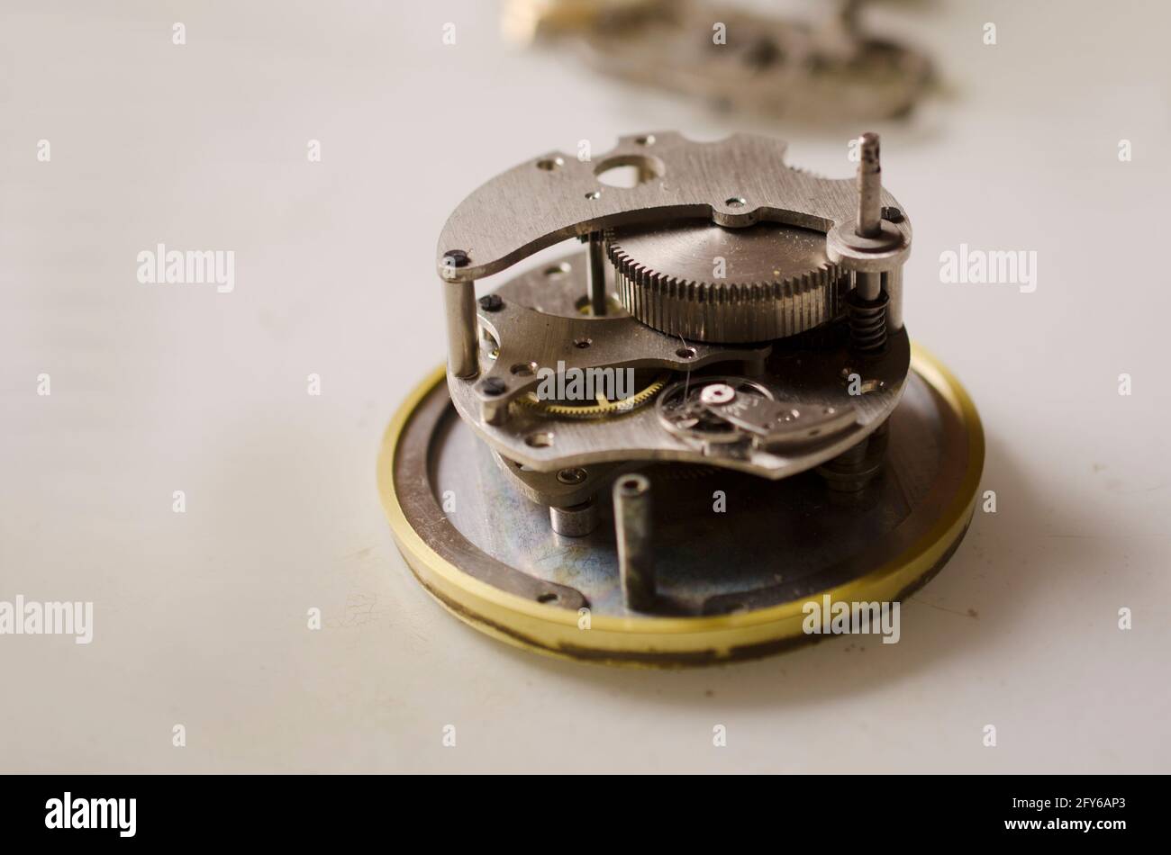 disassembled alarm clock close-up on a white background Stock Photo - Alamy