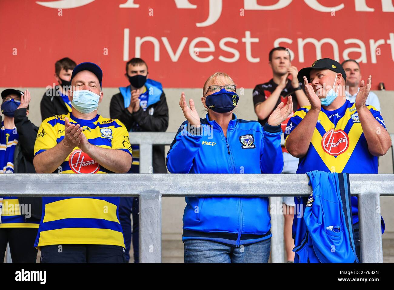 Warrington Wolves fans applaud there team Stock Photo - Alamy