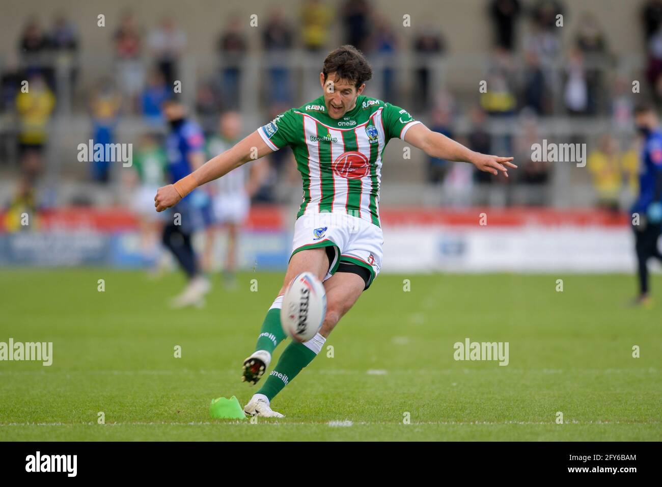 Stefan Ratchford (1) of Warrington Wolves successfully kicks a ...