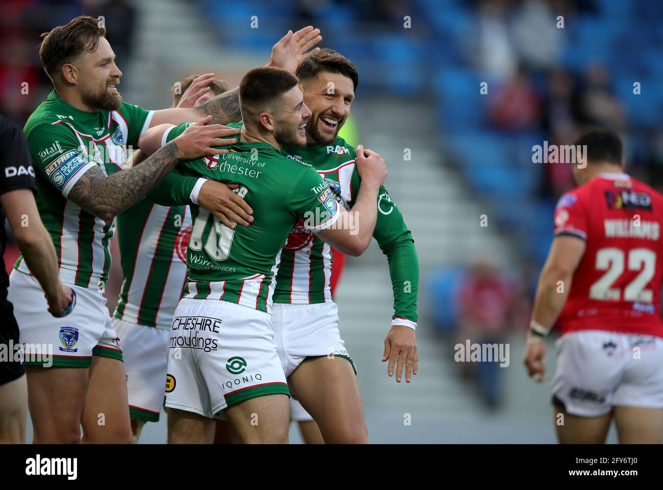 Warrington Wolves' Danny Walker (2nd left) celebrates scoring their ...
