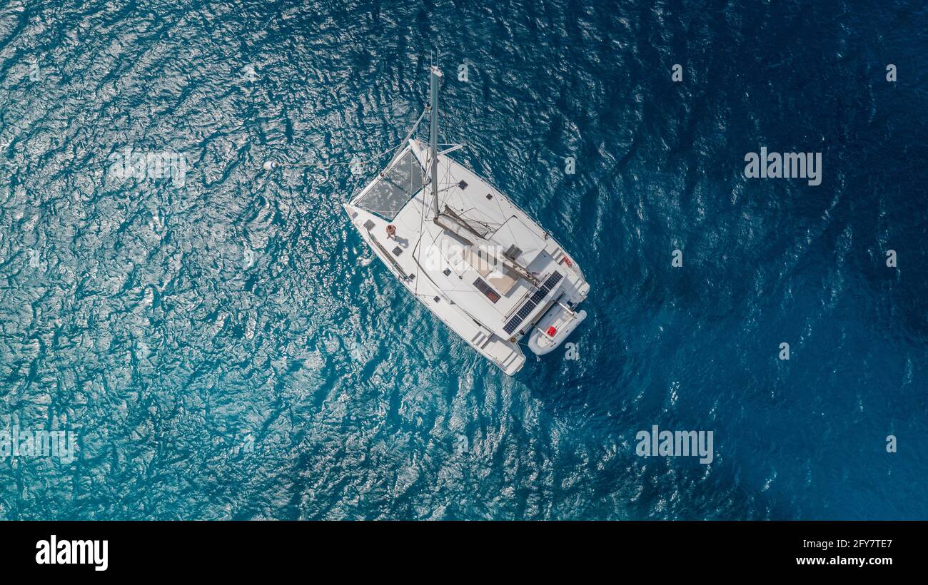 Aerial View of a Large Sailboat in BVI's Blue Water Stock Photo - Alamy