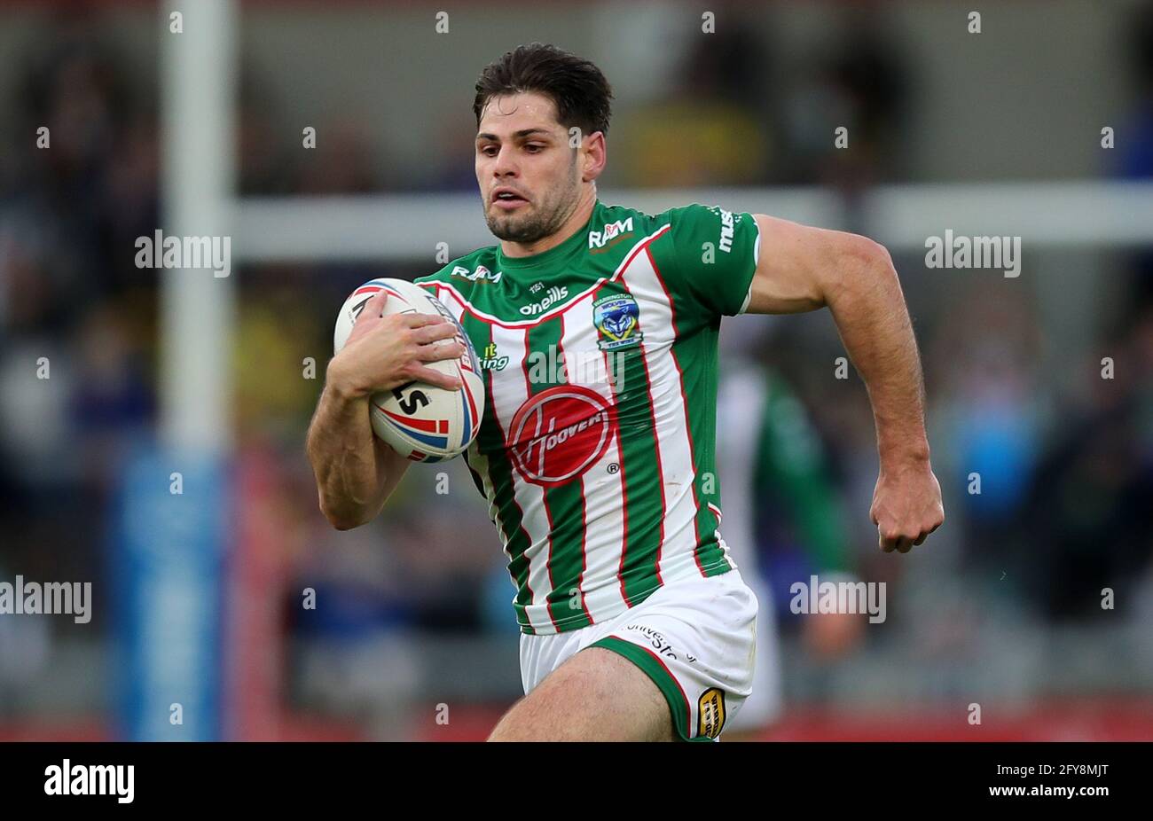 Warrington Wolves' Jake Mamo runs in their side's fourth try during the ...