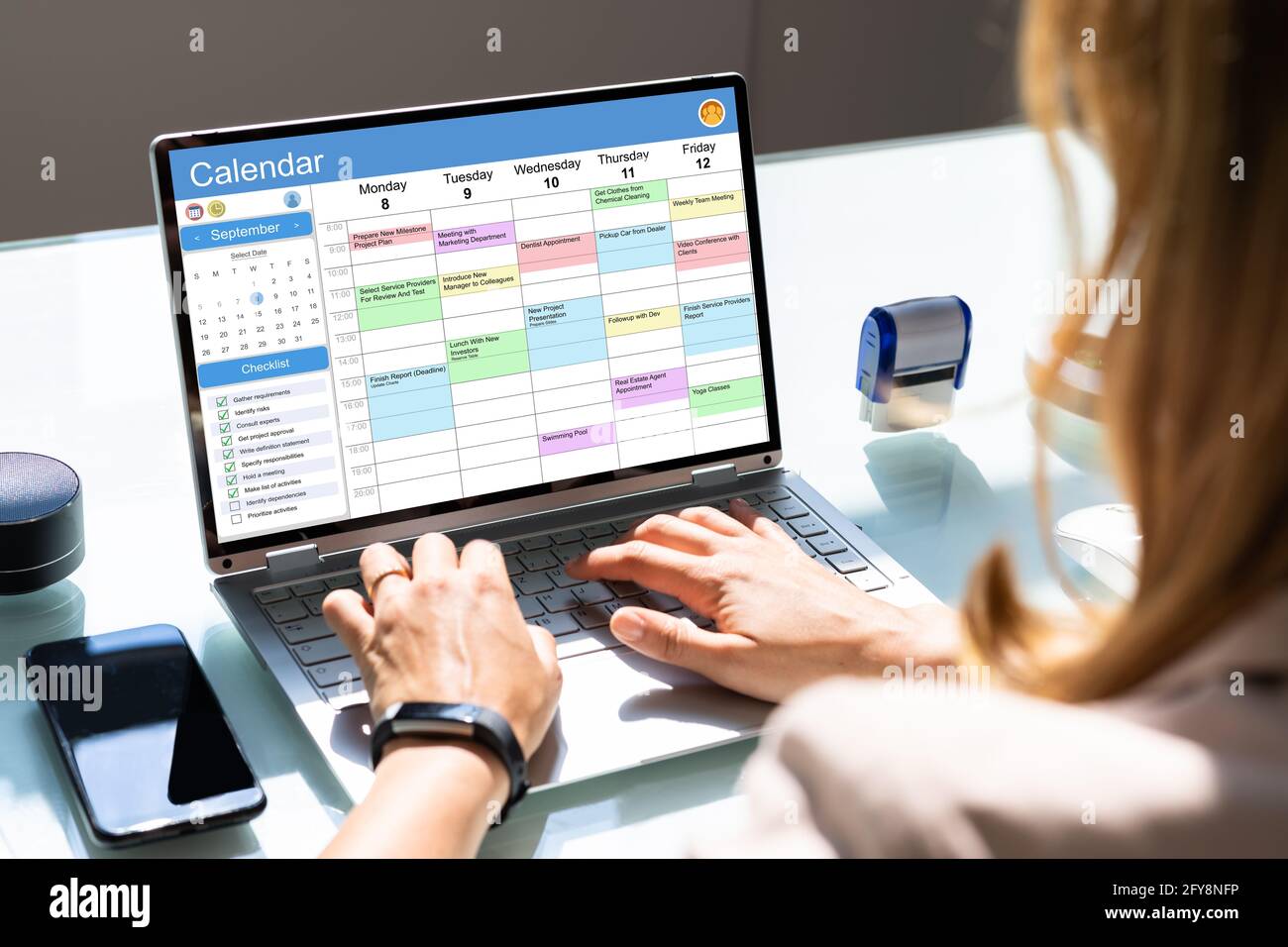 Executive Looking At Calendar. Date Arrangement On Computer Stock Photo ...